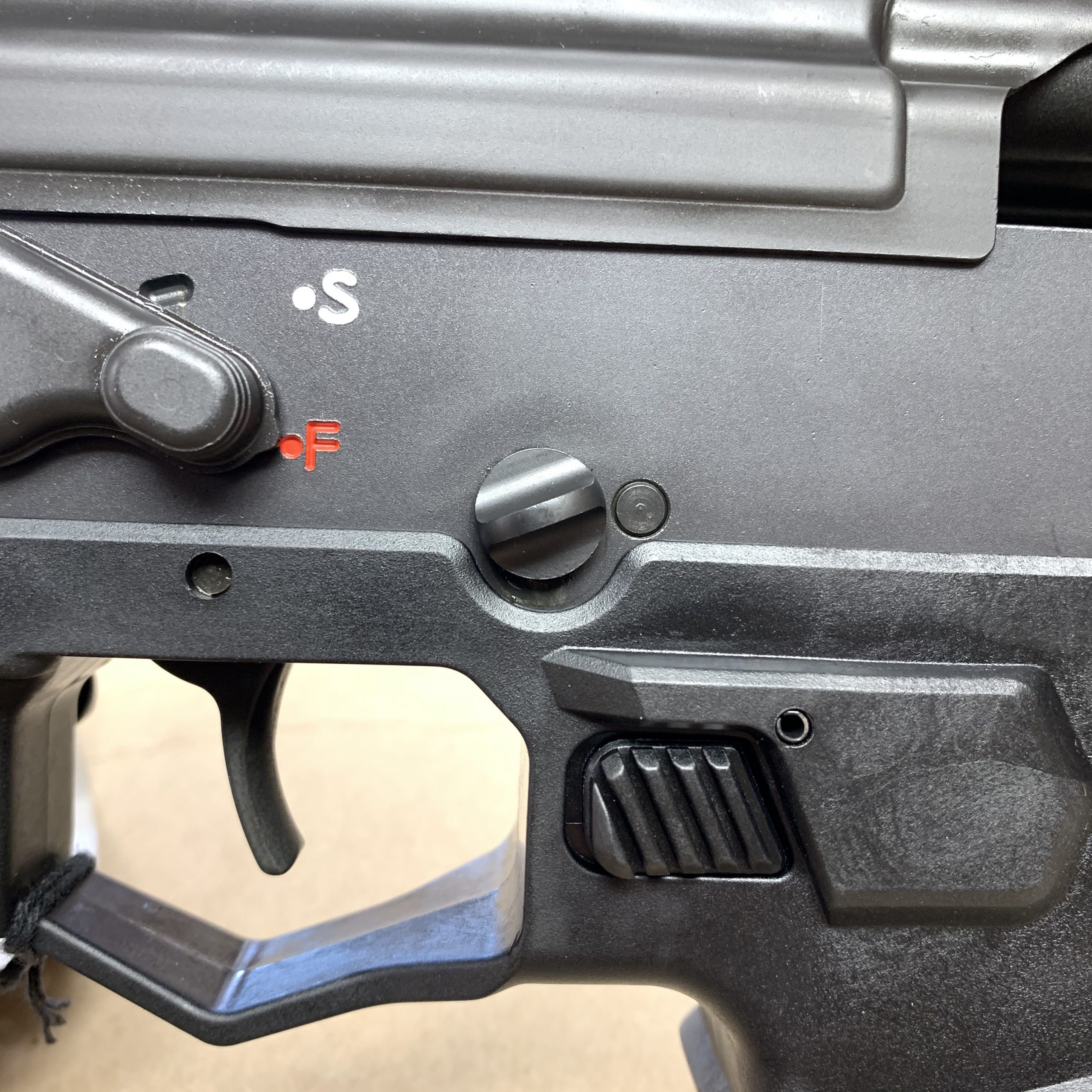 KNS PRECISION SHOWS OFF NEW ENHANCED 5.56 GALIL ACE BOLT CATCH BUTTON