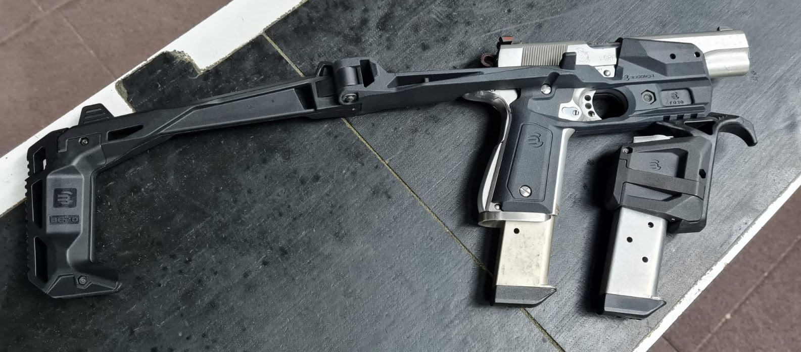 RECOVER TACTICAL TEASES 1911 STABILIZER AND ANGLED MAG POUCH