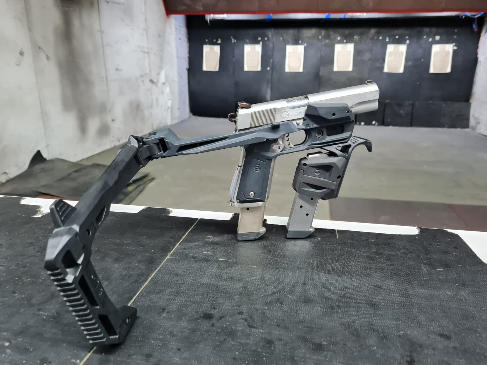 RECOVER TACTICAL TEASES 1911 STABILIZER AND ANGLED MAG POUCH