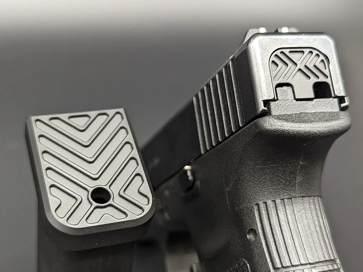 MILSPIN INTRODUCES THE WEIGHTED BRASS X-CARVE MAG BASE PLATE