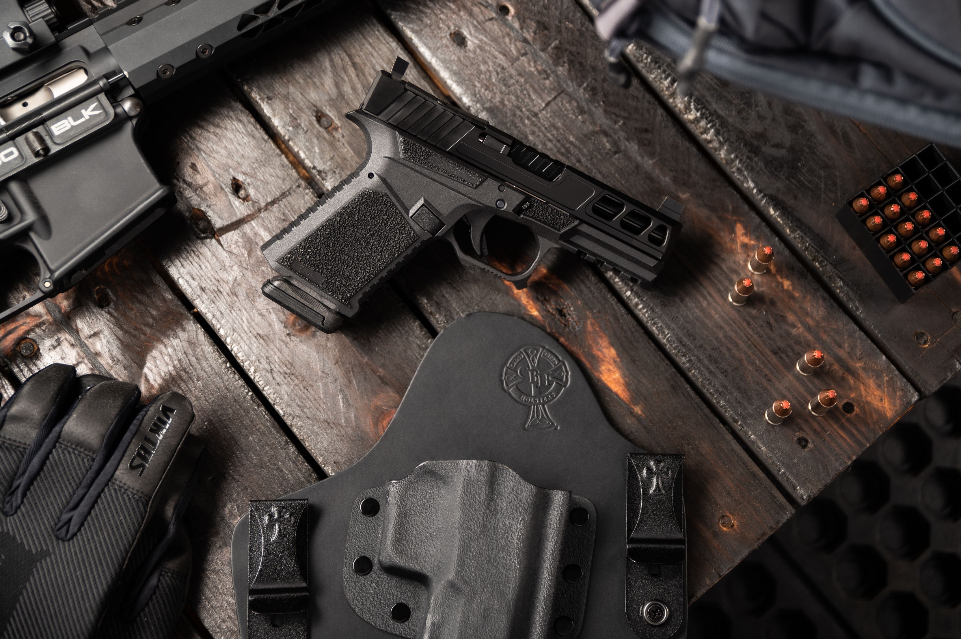 CROSSBREED HOLSTERS SHOWS SUPPORT ANDERSON MFG WITH NEW KIGER 9C HOLSTERS