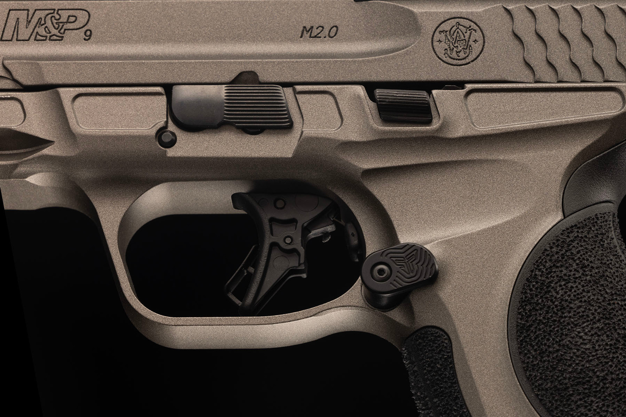 SPRINGER PRECISION SHOWS OFF EXTENDED MAGAZINE RELEASE PADDLE FOR S&W METAL